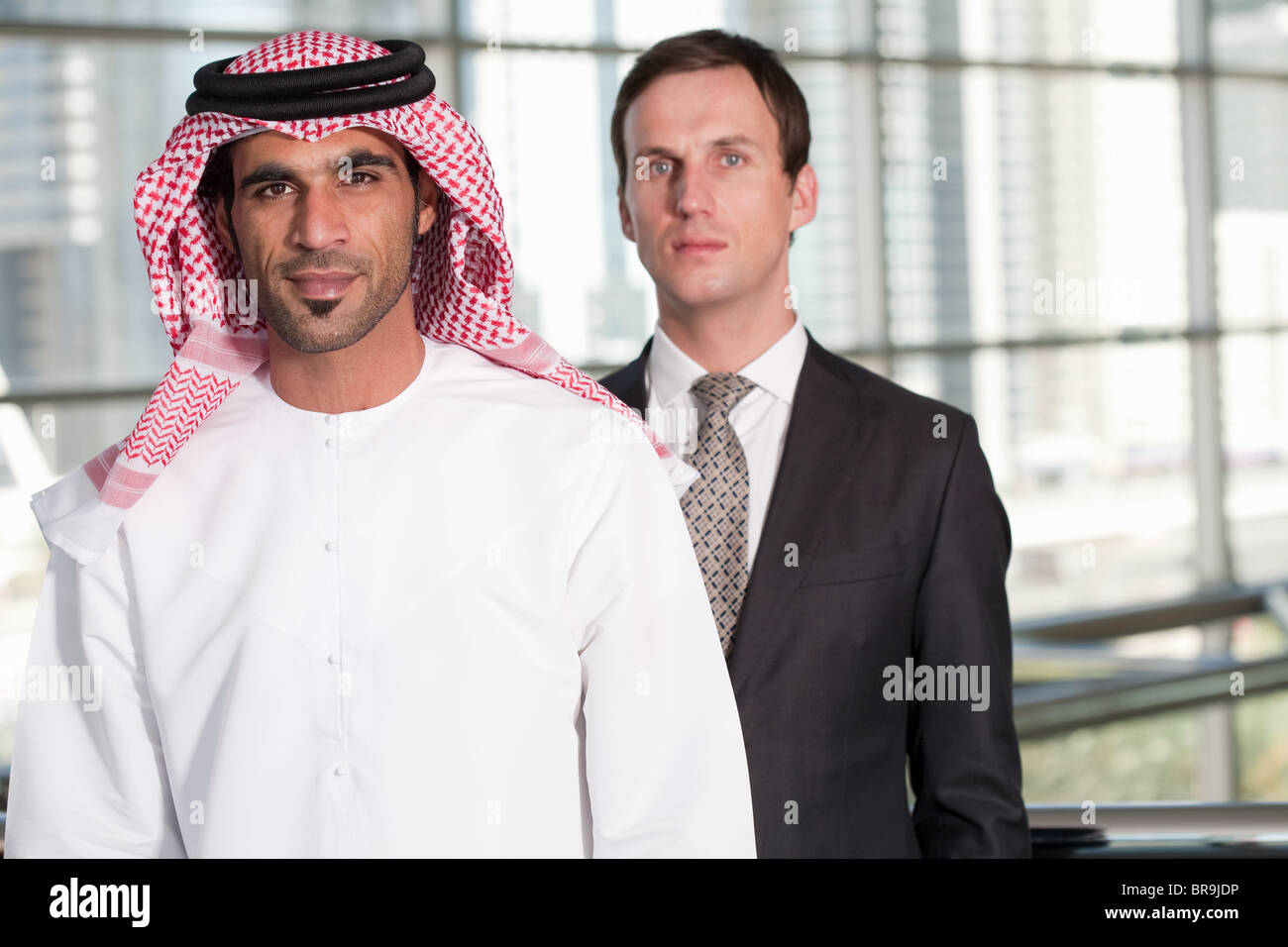 Western and middle eastern businessman Stock Photo - Alamy