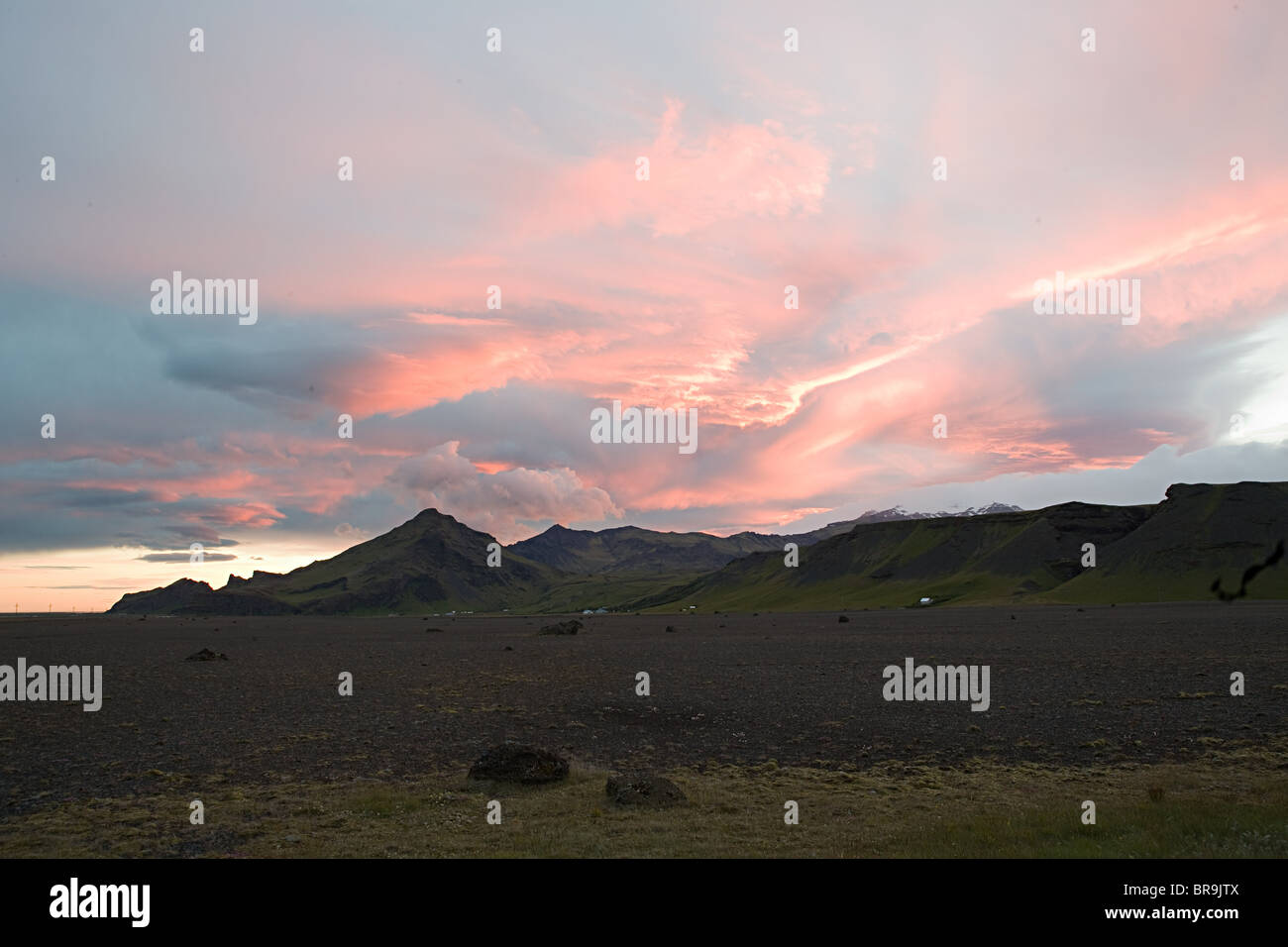 Iceland, sunset over volcanic mountains Stock Photo - Alamy