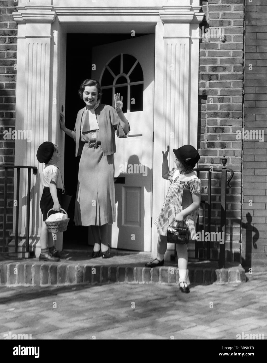 Group Of Kids Waving Goodbye