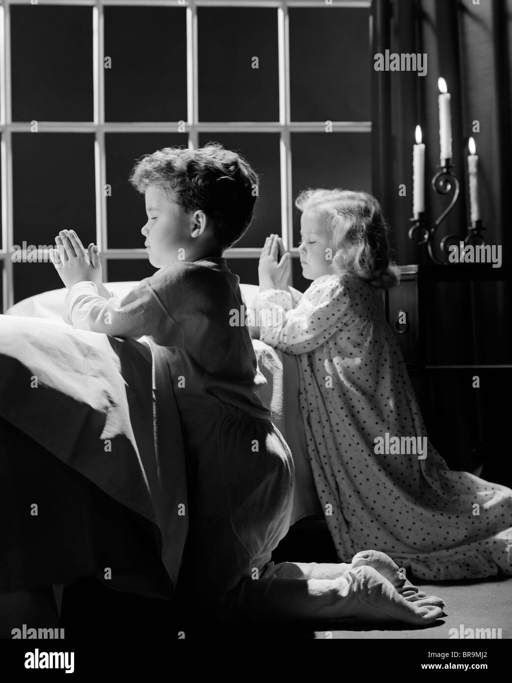 School kids praying at school Black and White Stock Photos & Images - Alamy