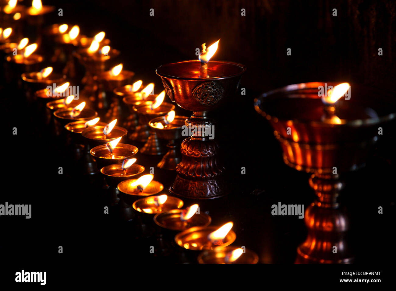 butter lamps at a monastery Stock Photo - Alamy