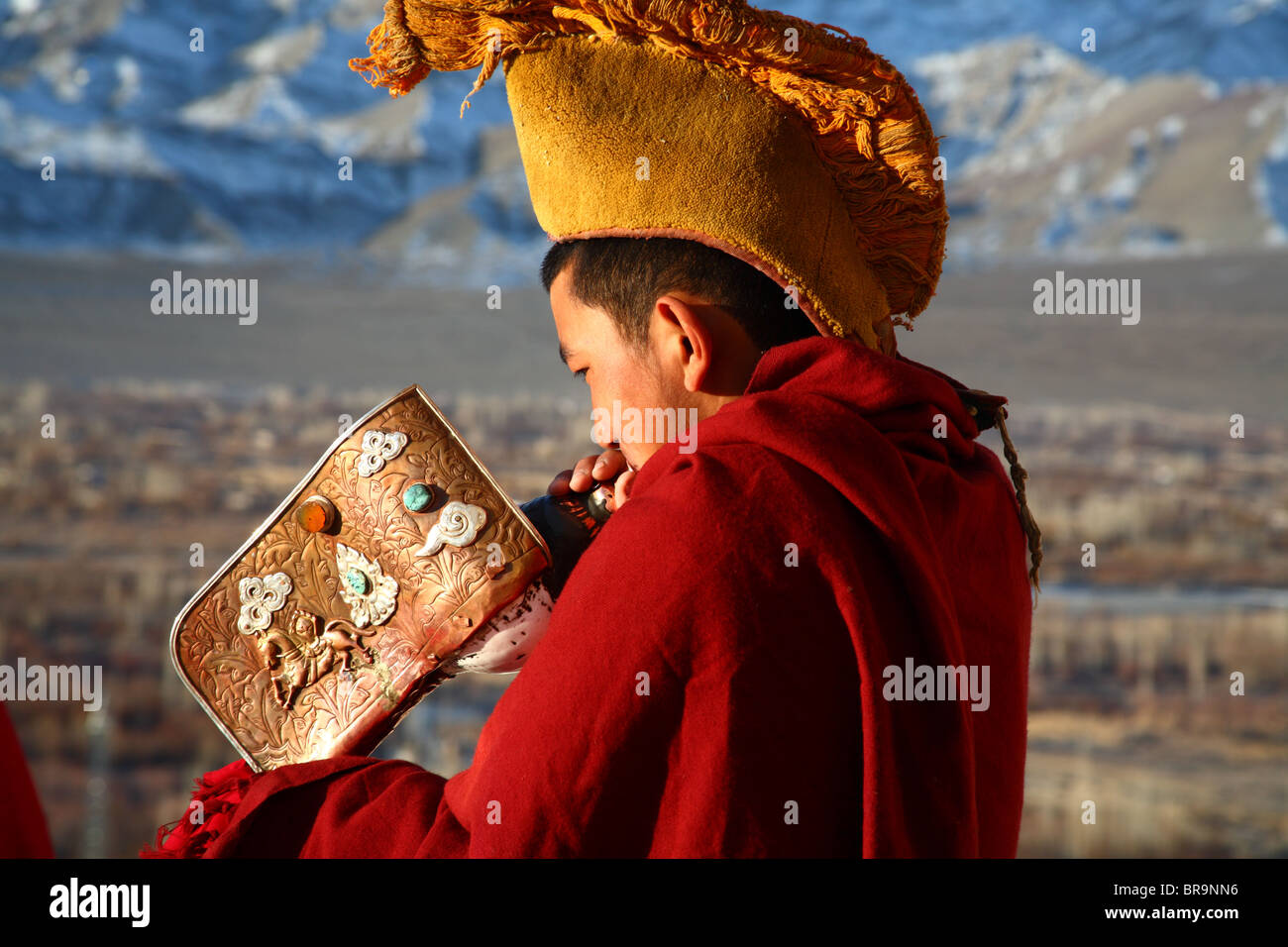 Monks call for the morning prayer Stock Photo - Alamy