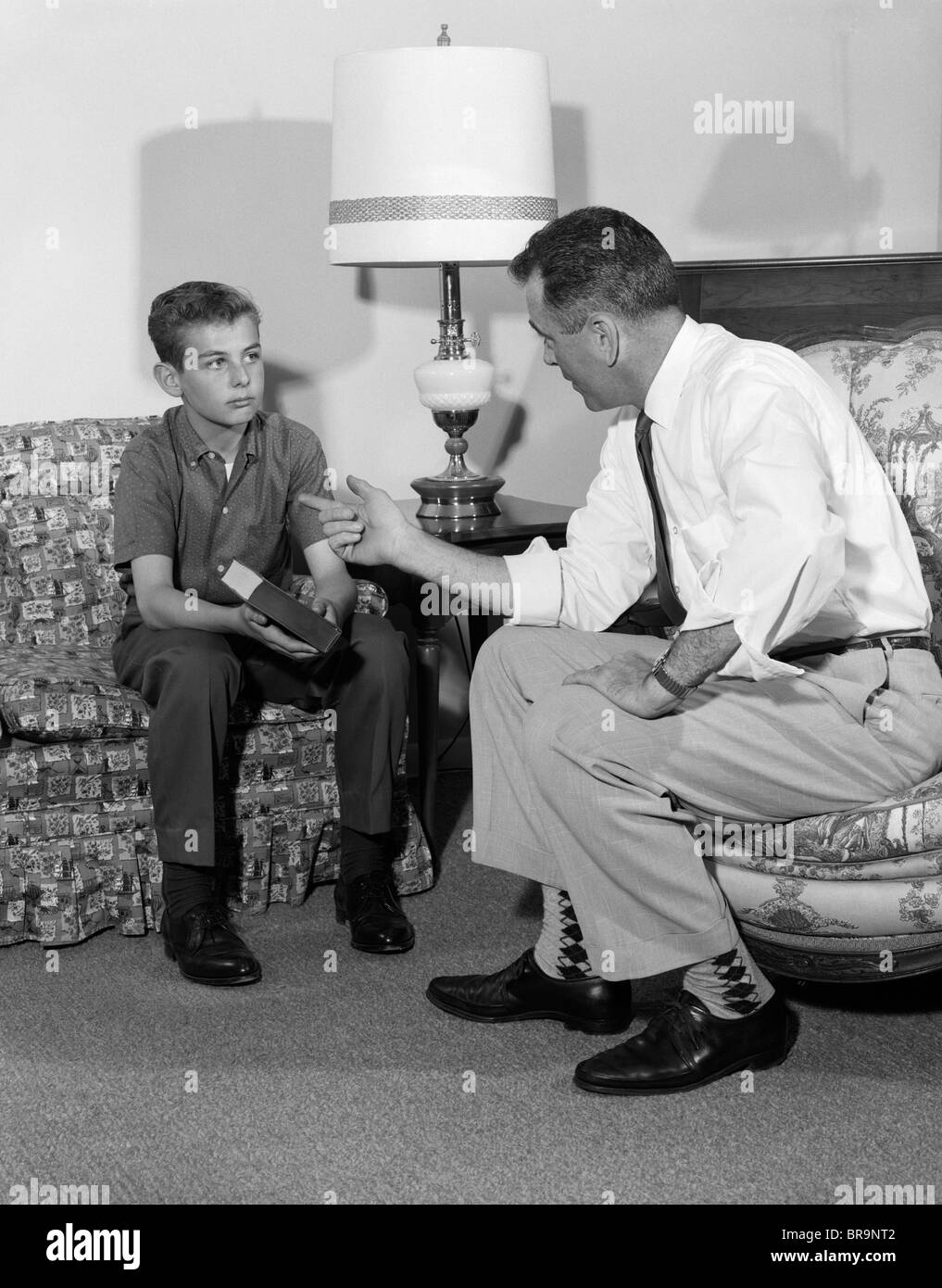 Father lecturing child Black and White Stock Photos & Images - Alamy