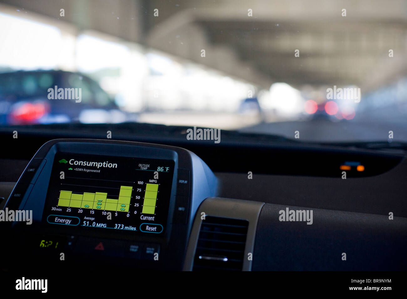 The dashboard of a hybrid car while driving in traffic in Oregon Stock ...