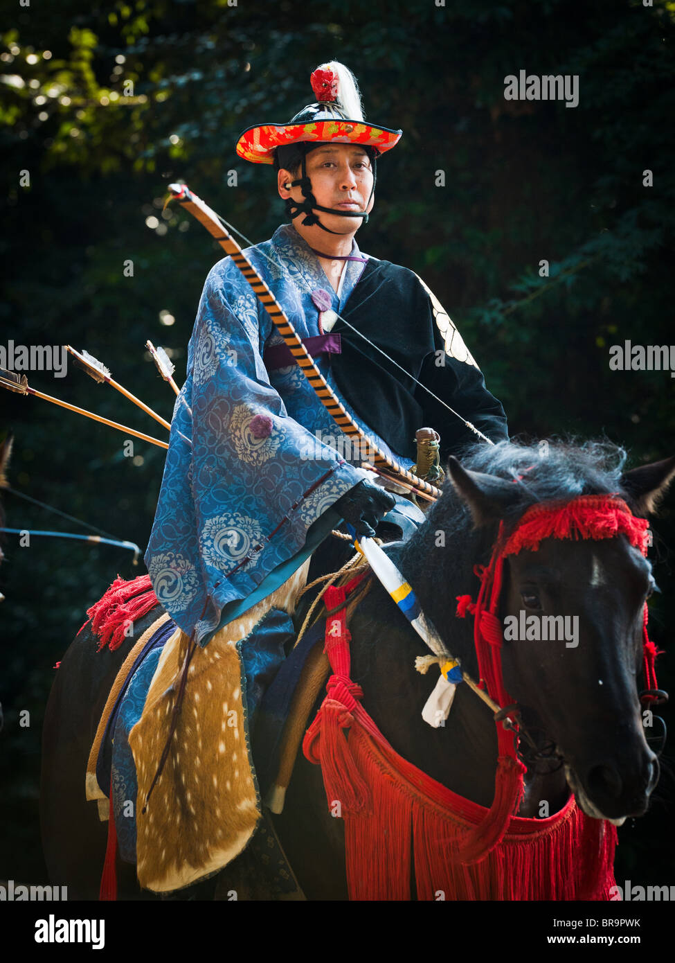 An archer in ancient samurai warrior uniform Stock Photo - Alamy