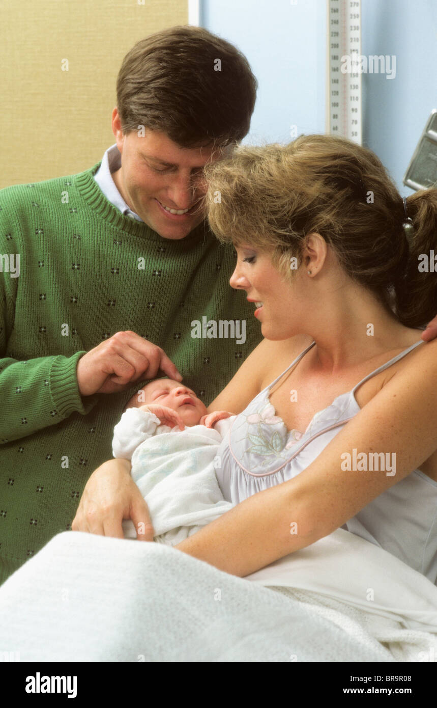 1980s PARENTS WITH NEWBORN INFANT Stock Photo - Alamy