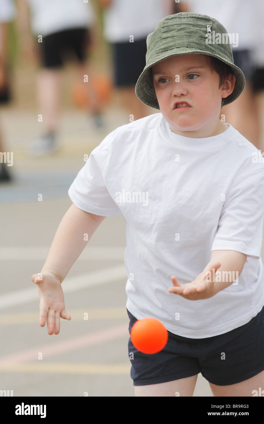 School Sport Day - throwing the ball Stock Photo - Alamy