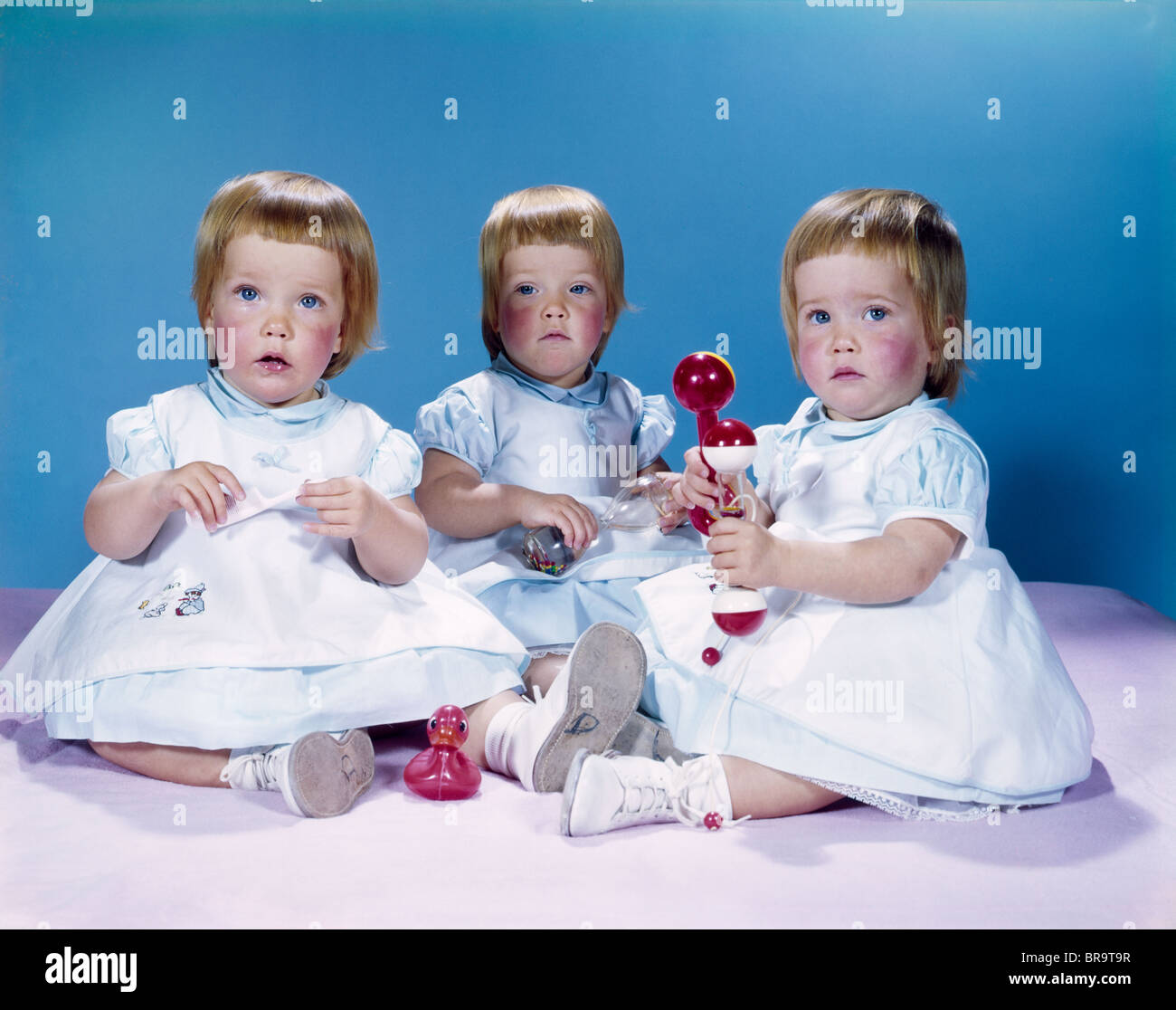 Triplets children hi-res stock photography and images - Alamy
