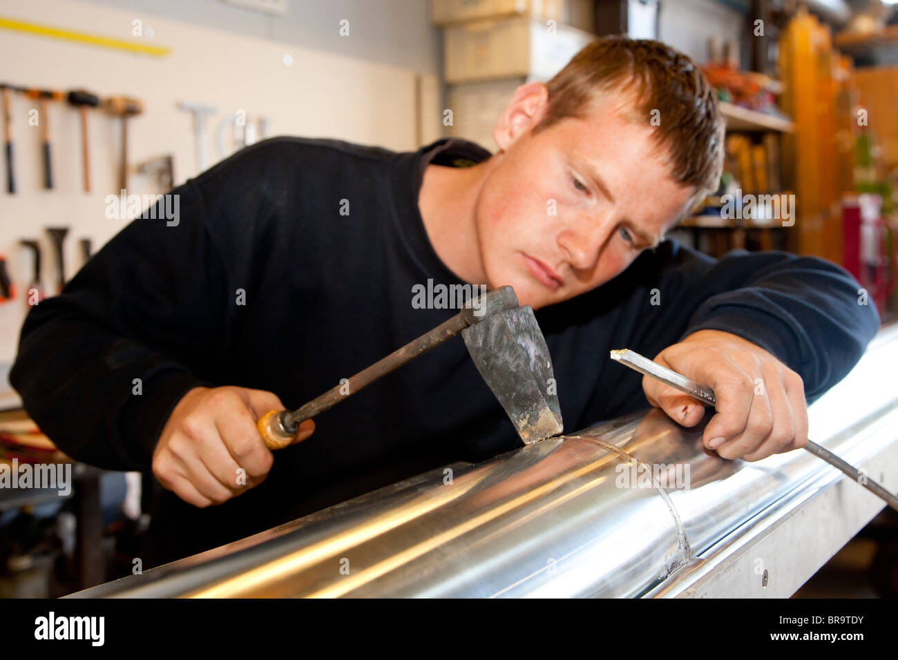 Young craftsman plumber construction hi-res stock photography and ...