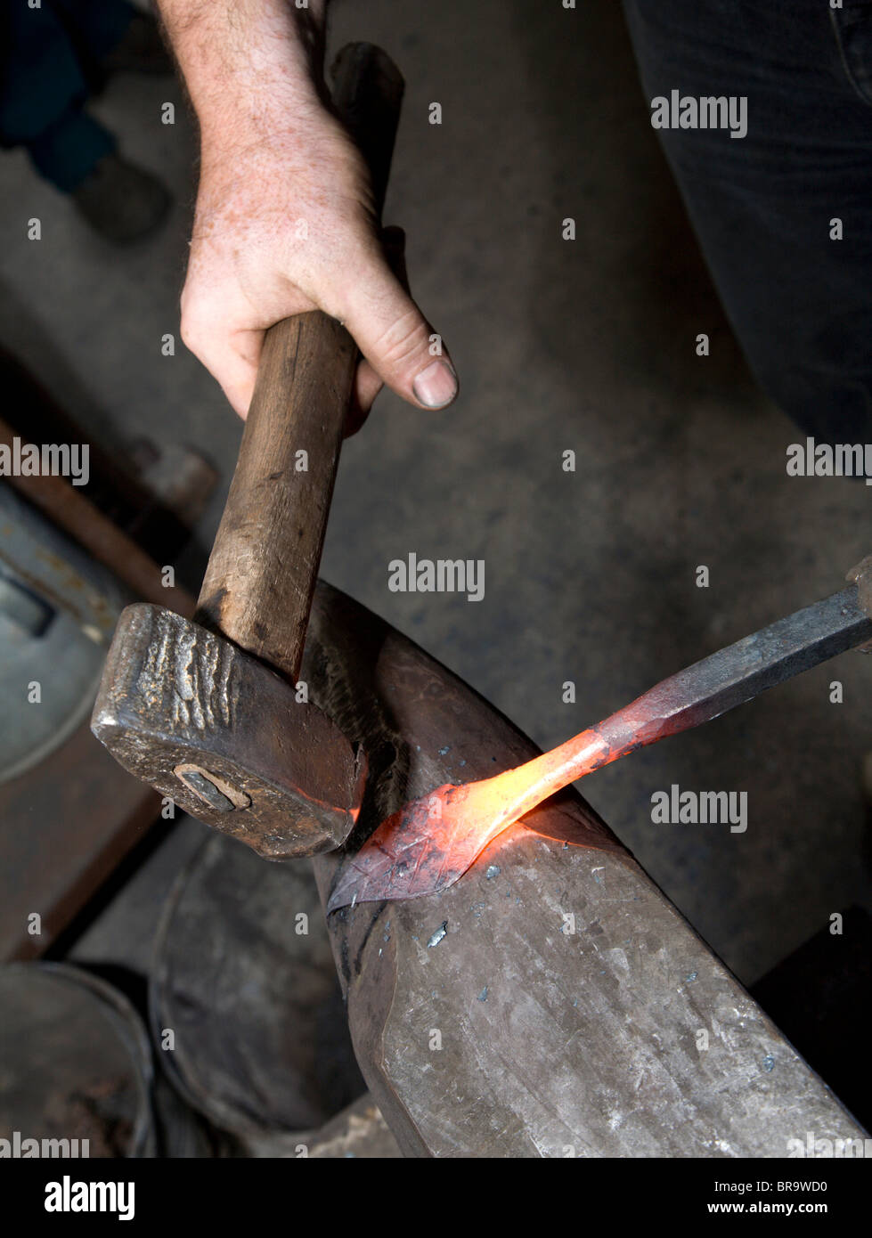 hands of the smith by the work Stock Photo - Alamy