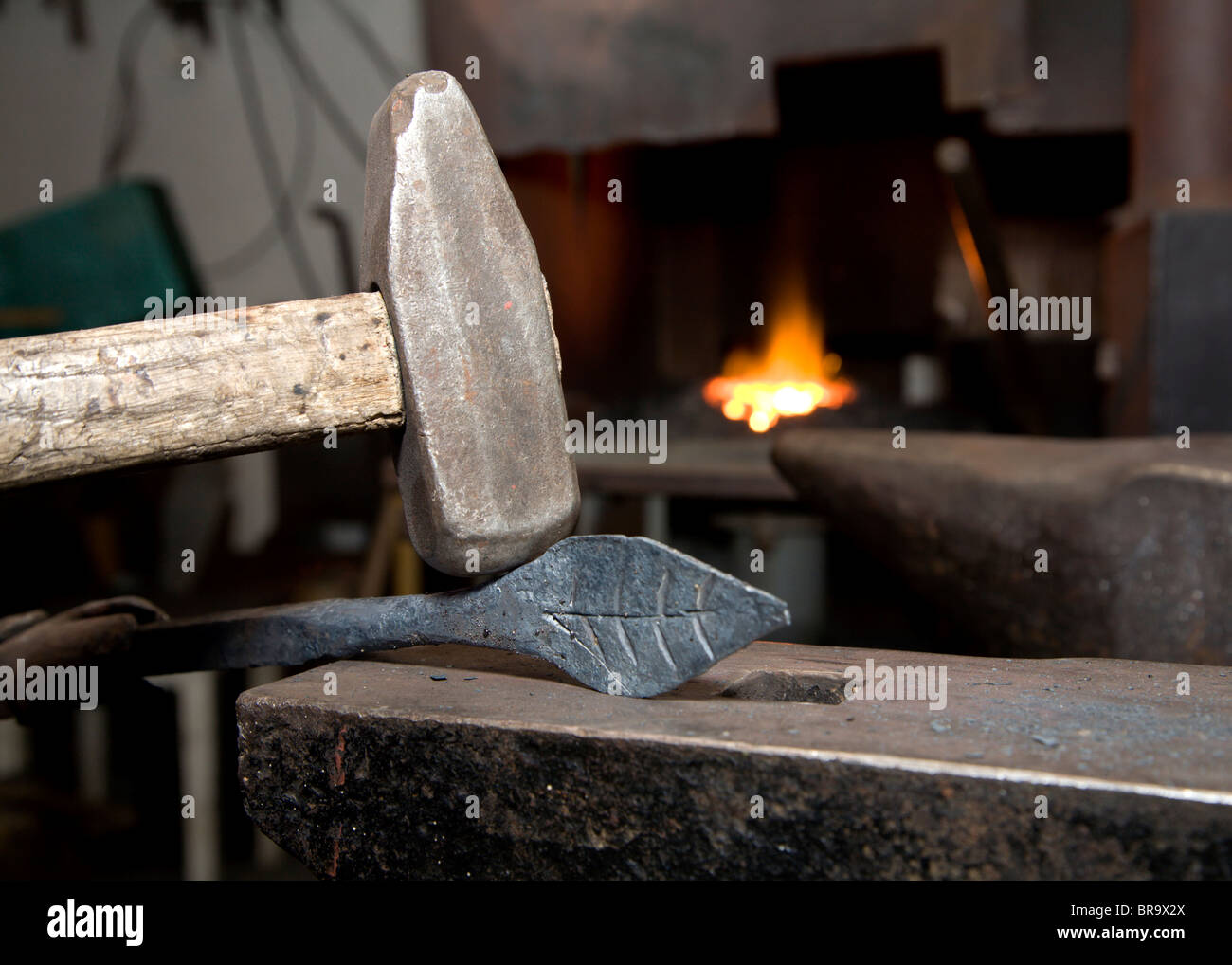 hands of the smith by the work Stock Photo - Alamy