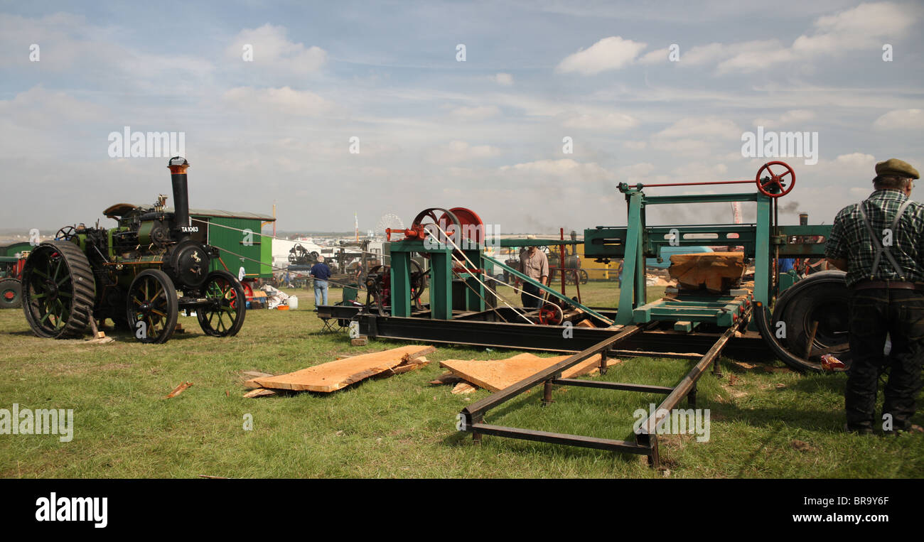 Steam engine powered band saw timber cutting Stock Photo - Alamy