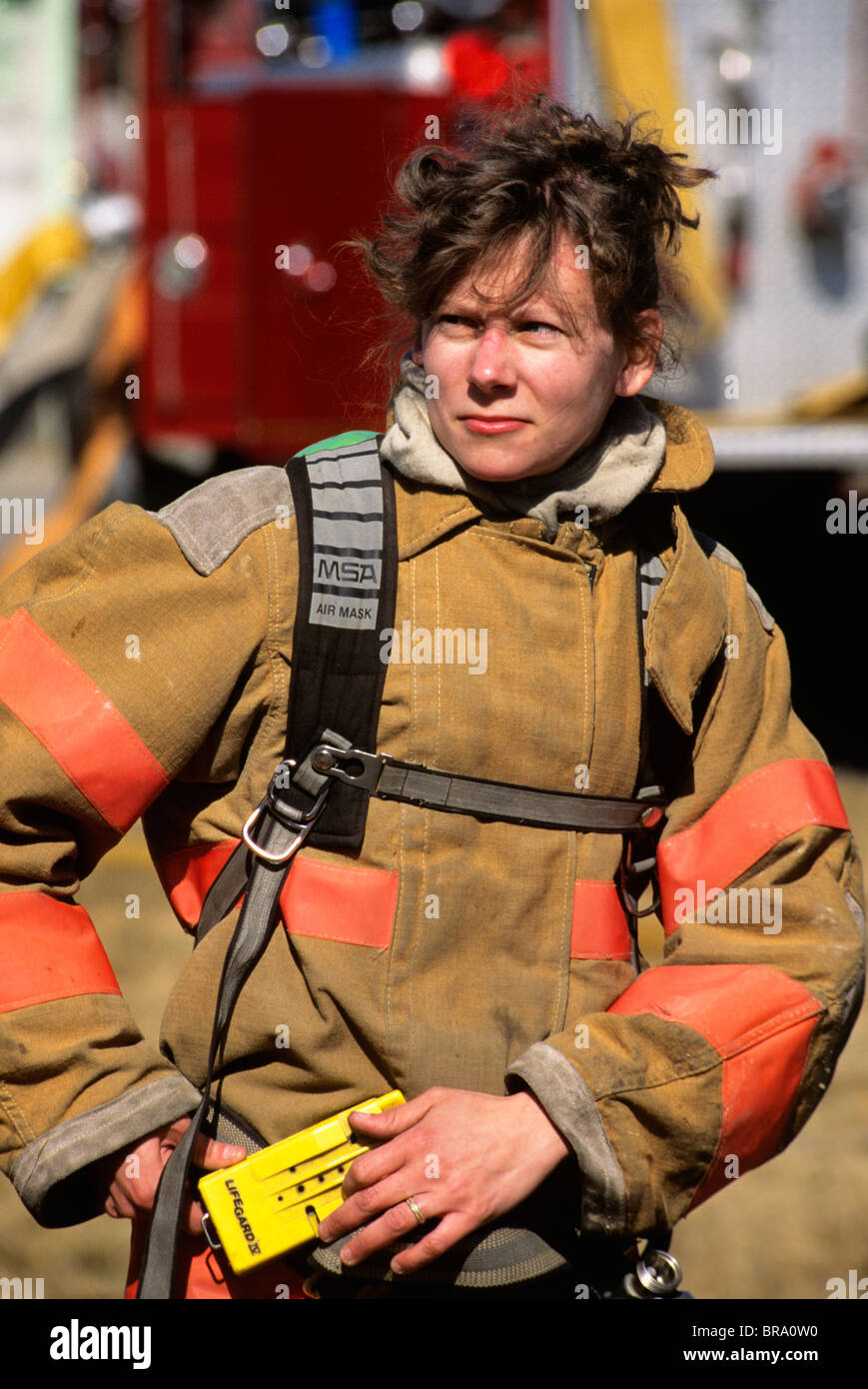 SERIOUS PORTRAIT WORKING WOMAN FIREFIGHTER Stock Photo - Alamy
