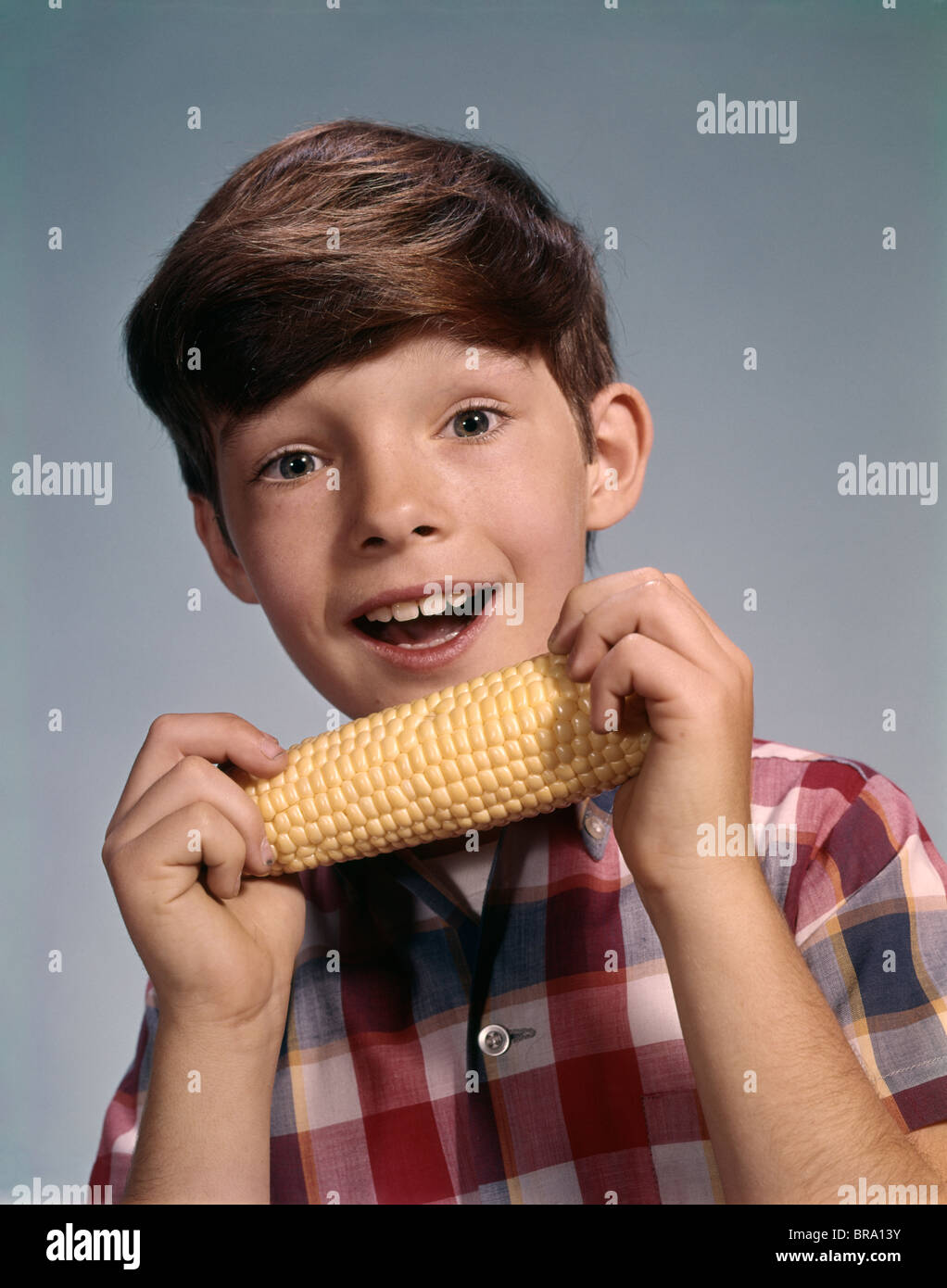 1960s SMILING BOY EATING CORN ON THE COB Stock Photo - Alamy
