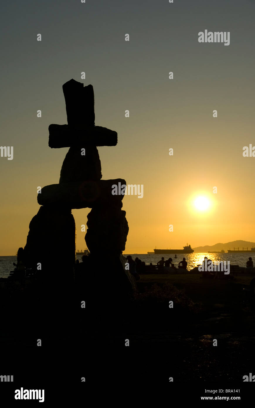 Inukshuk sculpture at sunset, English Bay, Vancouver Stock Photo - Alamy