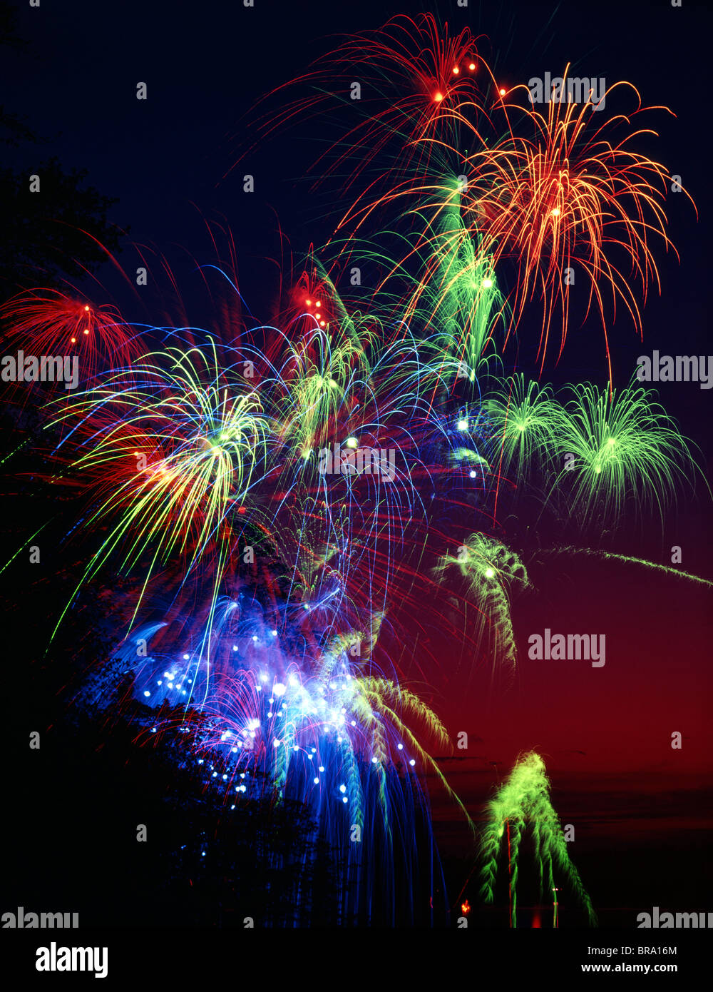 COLORFUL FIREWORKS DISPLAY IN NIGHT SKY Stock Photo - Alamy