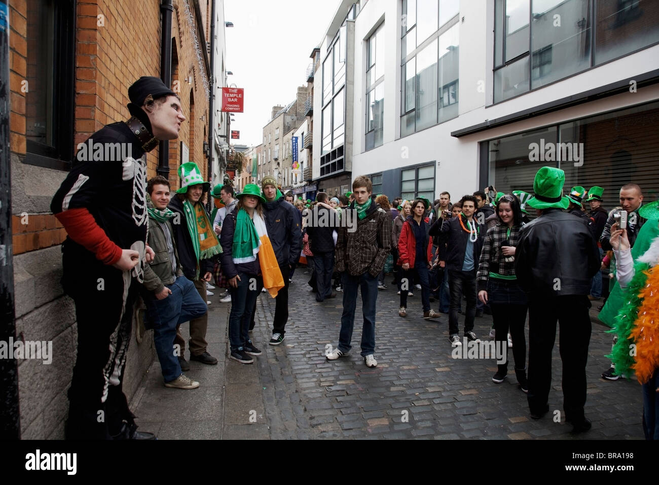 Dublin, Ireland; A Crowd Gathers In The Street To See A Performer For ...