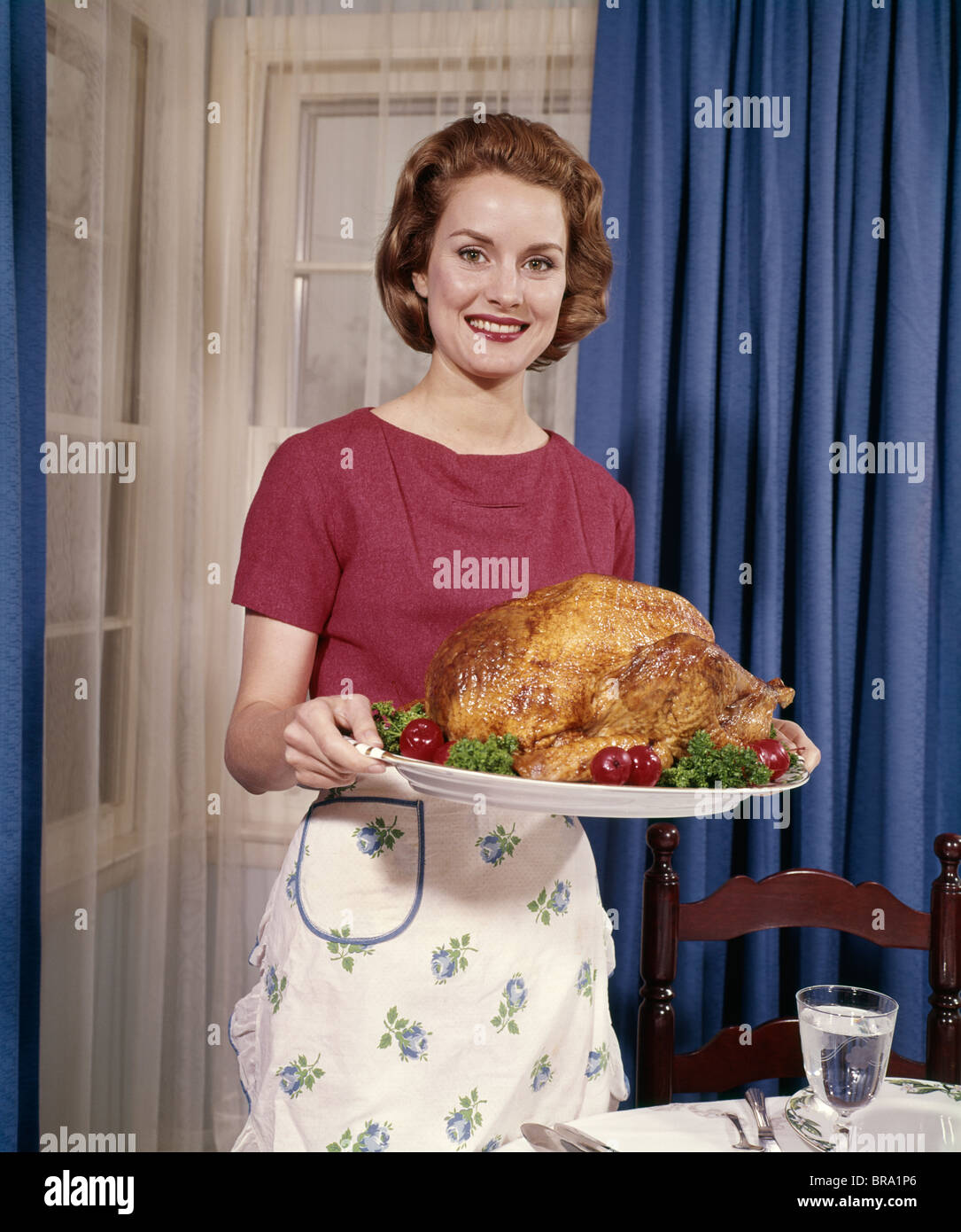 Woman apron 1960s hi-res stock photography and images - Alamy