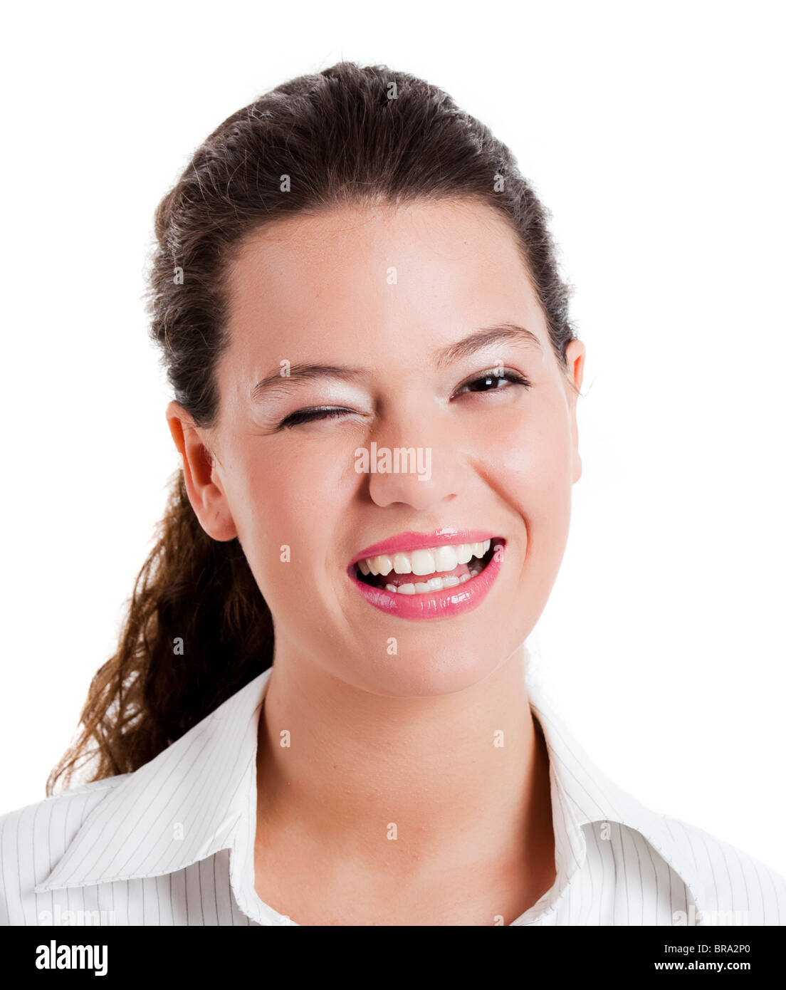 Portrait of a beautiful young woman winking Stock Photo - Alamy