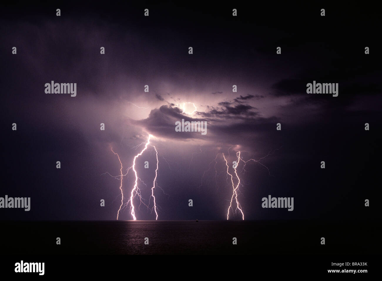 LIGHTNING STORM AT NIGHT OVER WATER Stock Photo - Alamy