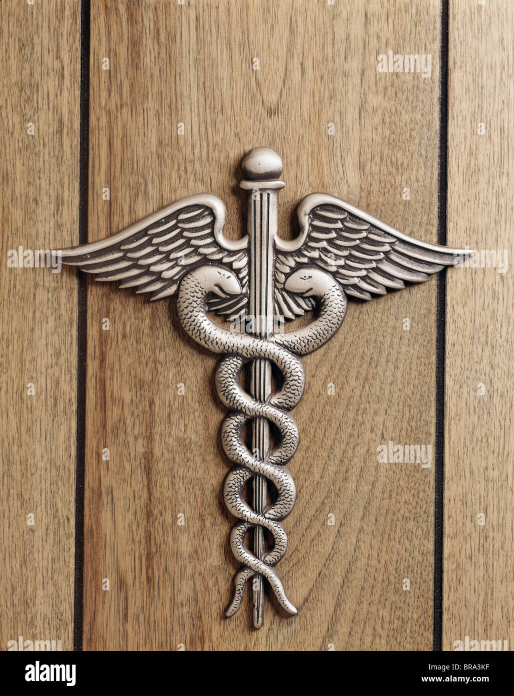 1970 1970s RETRO MEDICAL SYMBOL SNAKES WINGS Stock Photo - Alamy