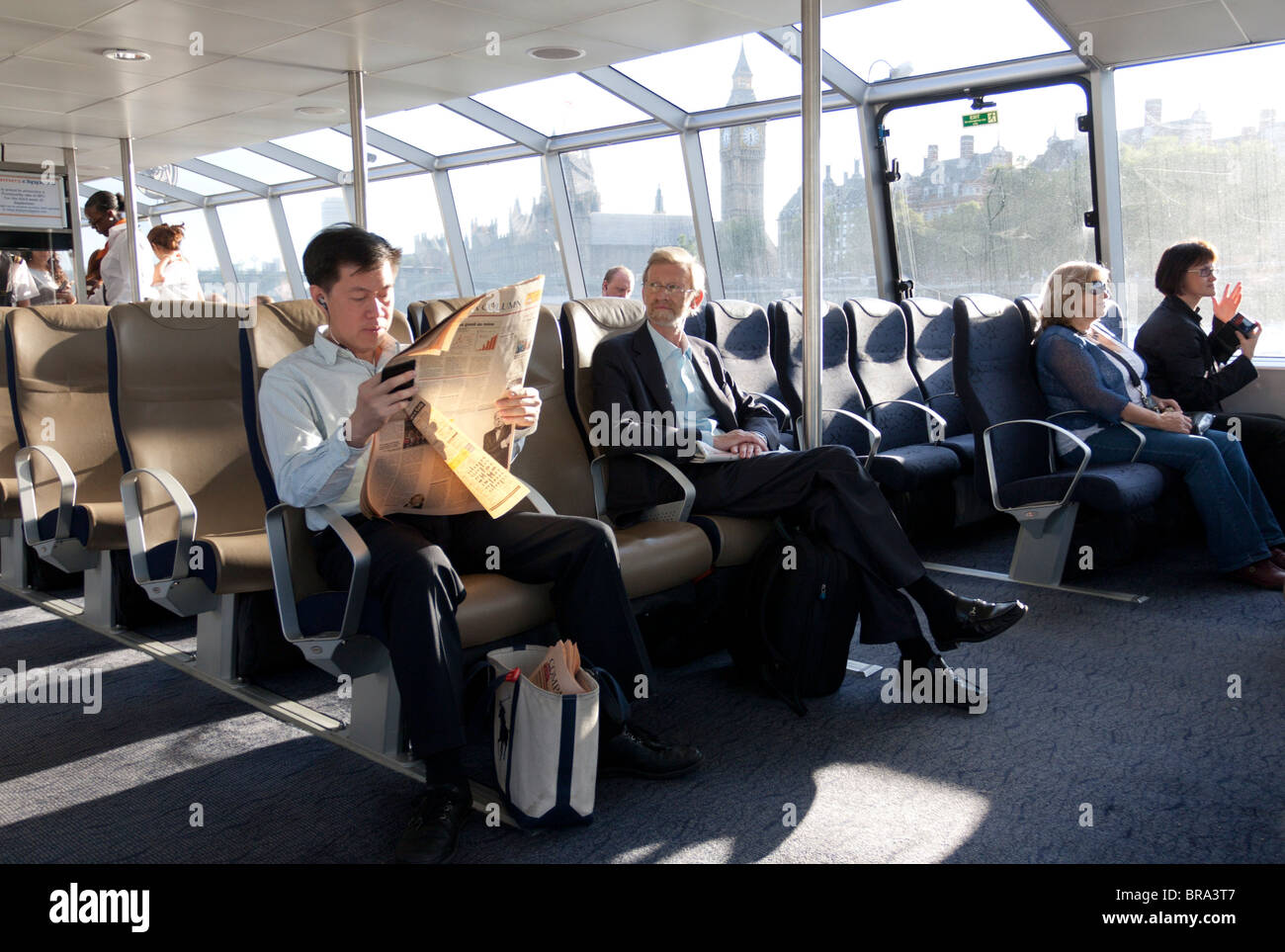 Thames clipper boat passengers hi-res stock photography and images - Alamy