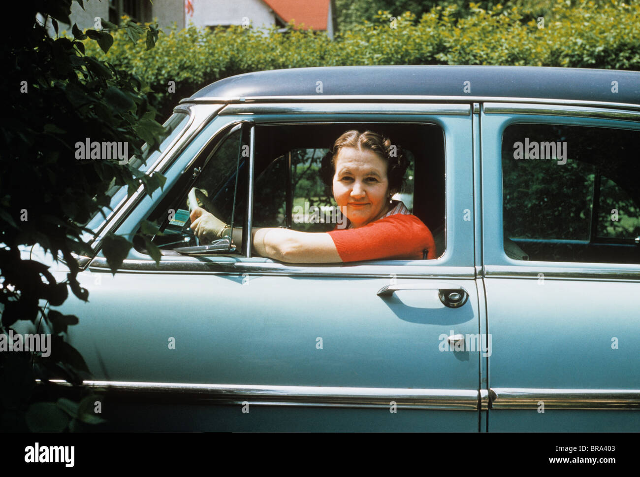 1950s WOMAN DRIVER LOOKING OUT OF CAR WINDOW Stock Photo - Alamy