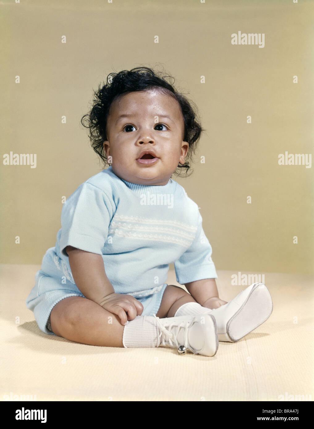 1960s PORTRAIT AFRICAN-AMERICAN BABY BOY WEARING BLUE OUTFIT WHITE ...