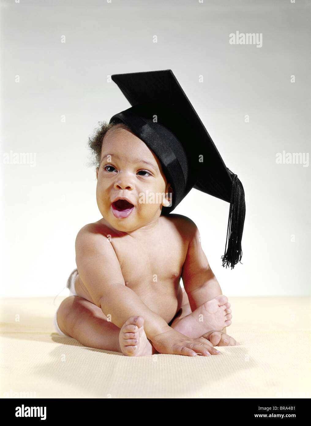 1960s AFRICAN-AMERICAN BABY BOY WEARING GRADUATION CAP MORTARBOARD ...