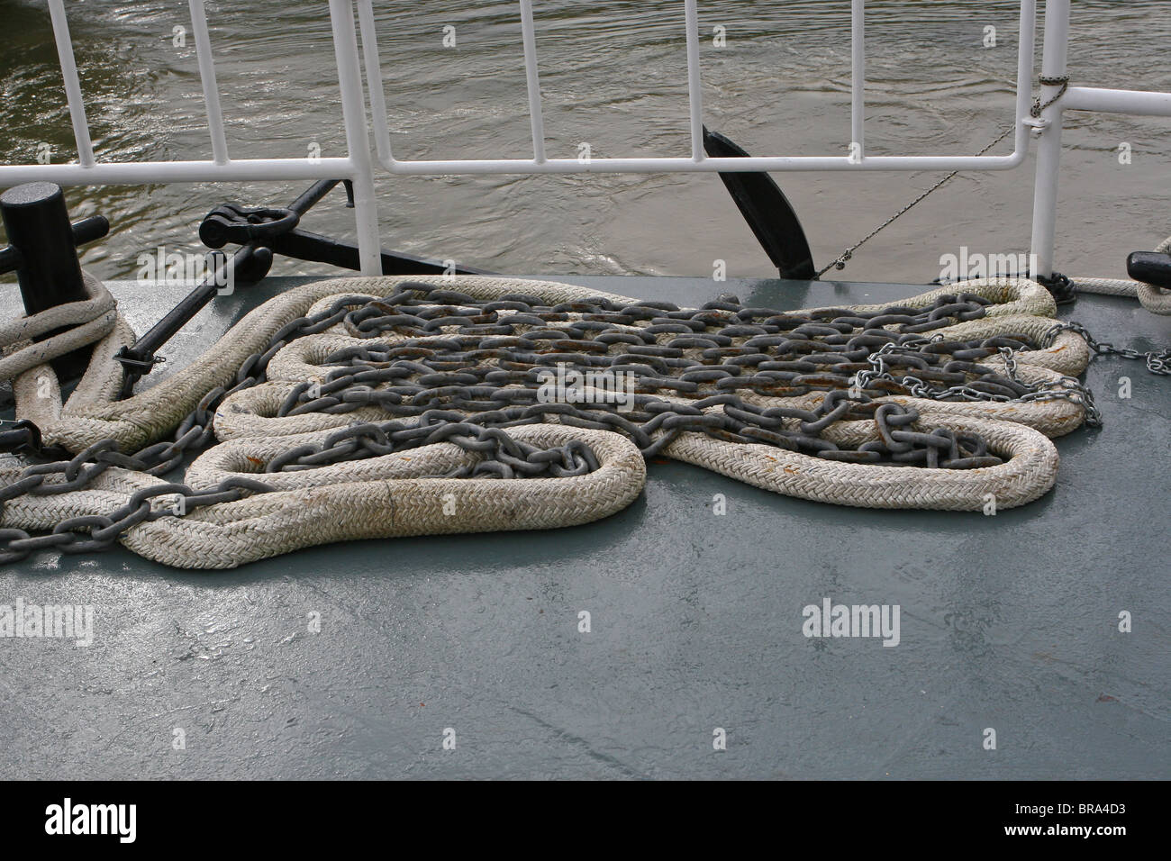 Anchor Rope and chain on a ship deck Stock Photo - Alamy