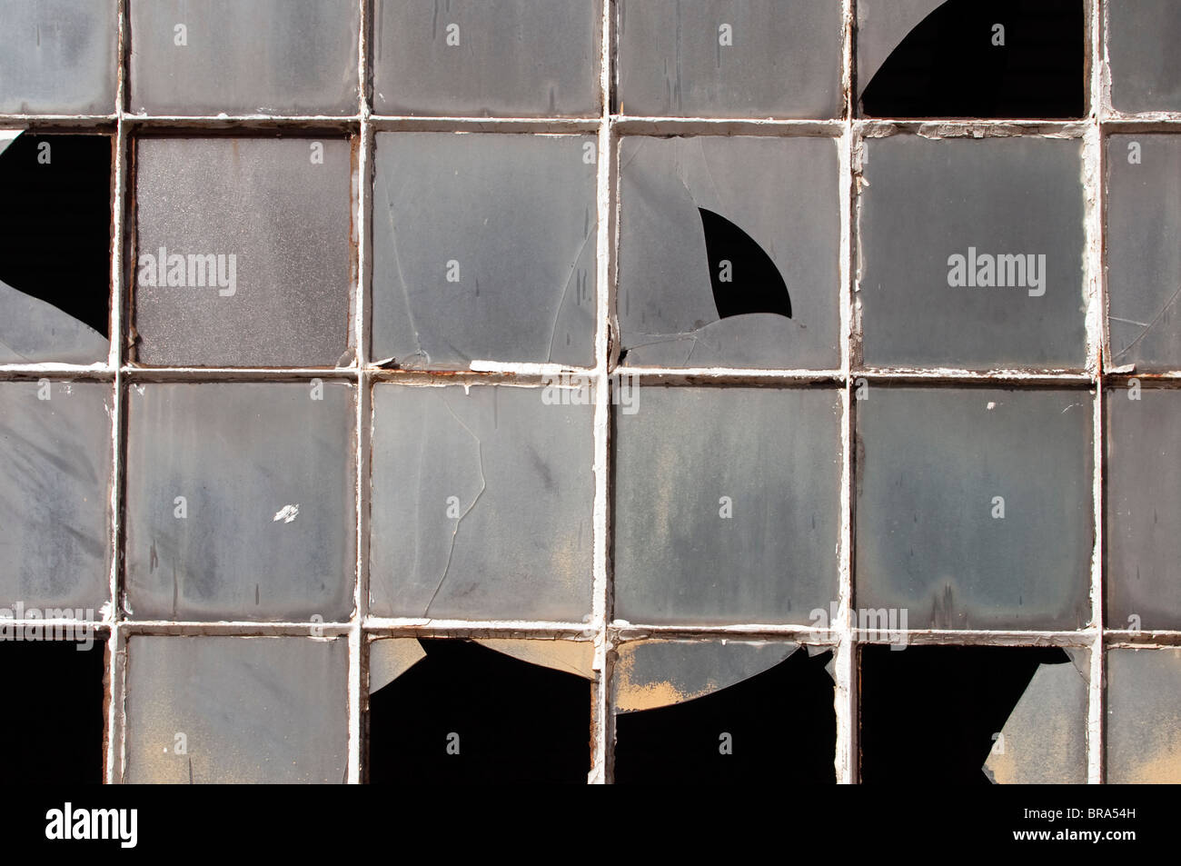 A window with broken glass Stock Photo - Alamy