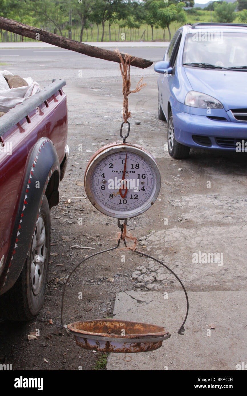 A mechanical scale in pounds seen at a local market in Capira, Panama ...