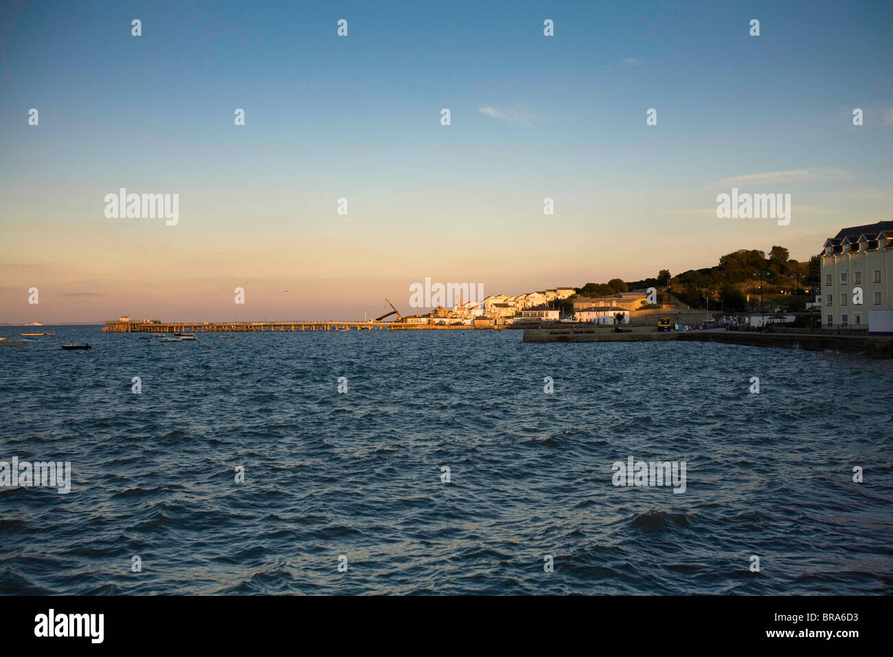 Sunset over Swanage Harbour Stock Photo - Alamy