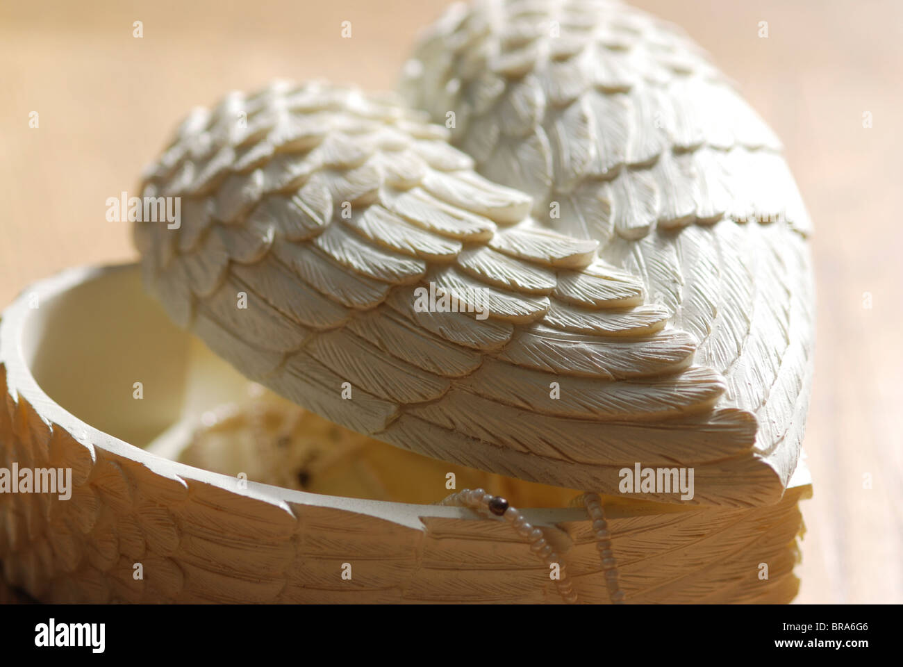 Box with angel wings Stock Photo - Alamy