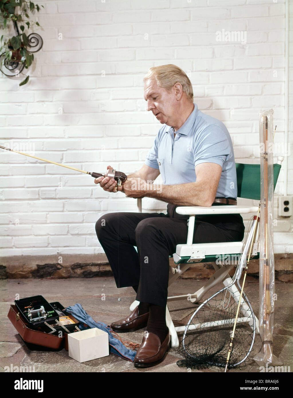 Man 1960's Vintage Sitting Chair High Resolution Stock Photography and ...