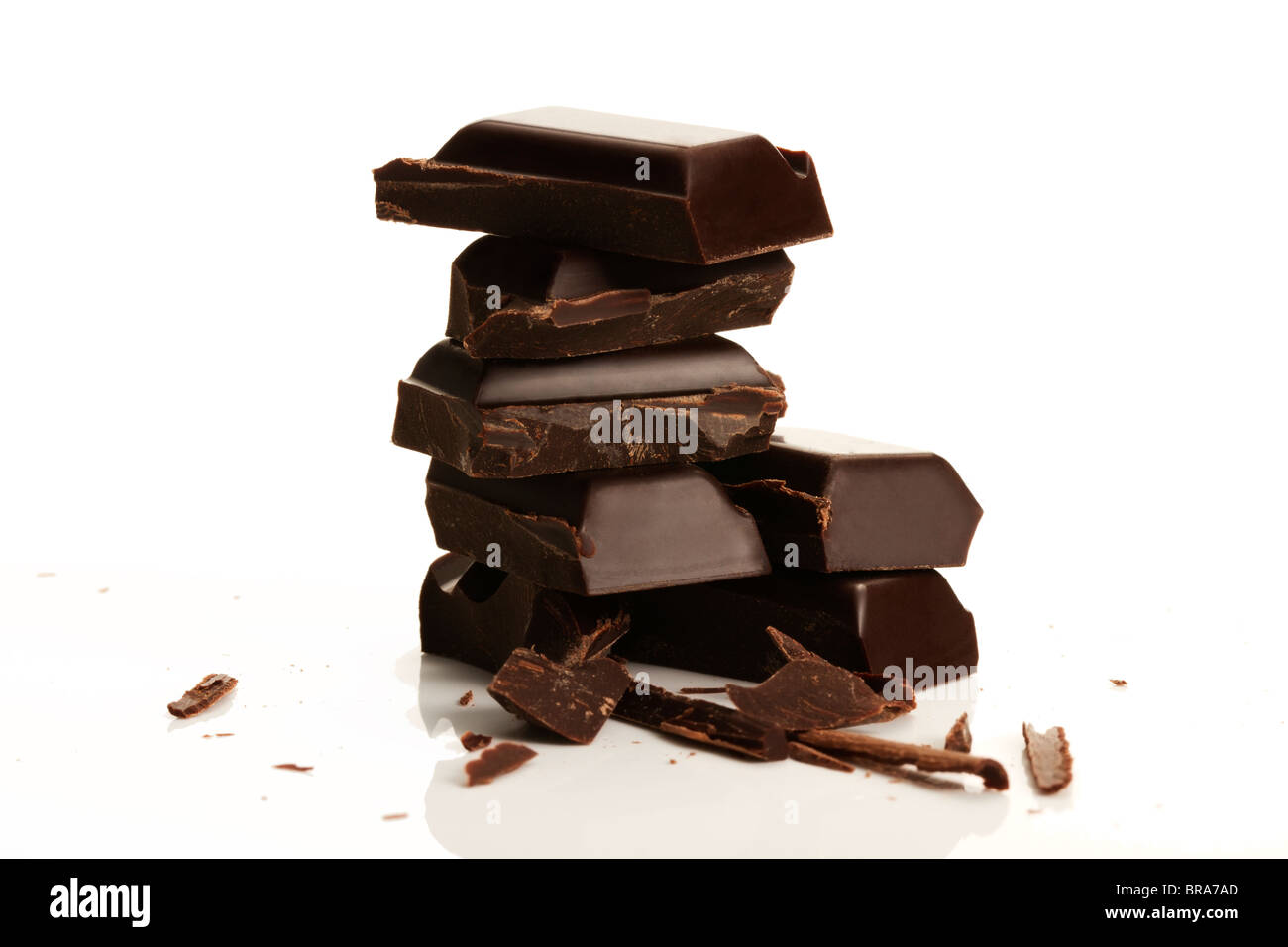 stack of plain chocolate on white background Stock Photo - Alamy