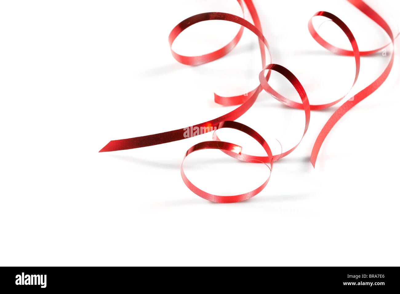 Red ribbon on white background Stock Photo - Alamy