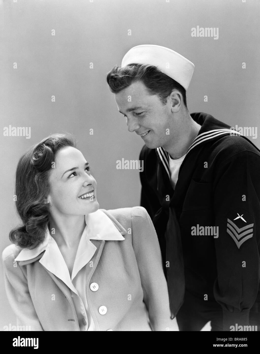 1940s SMILING COUPLE MAN WOMAN NAVY UNIFORM Stock Photo - Alamy