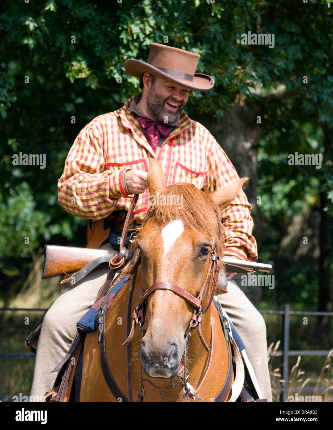 Cowboy with rifle hi-res stock photography and images - Alamy