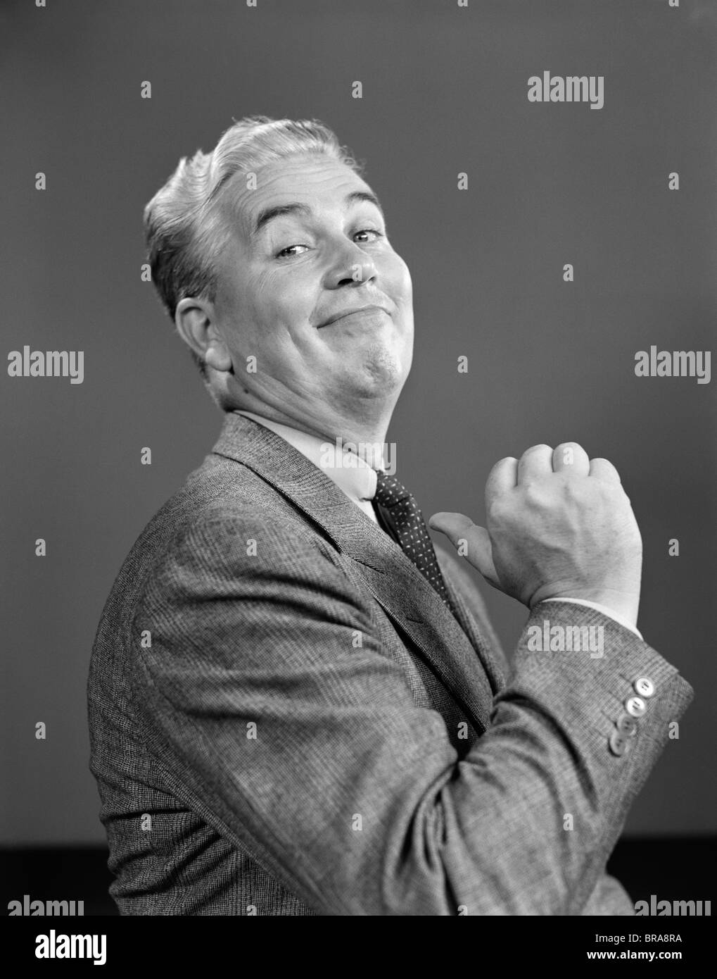 Man smiling finger pointing Black and White Stock Photos & Images - Alamy