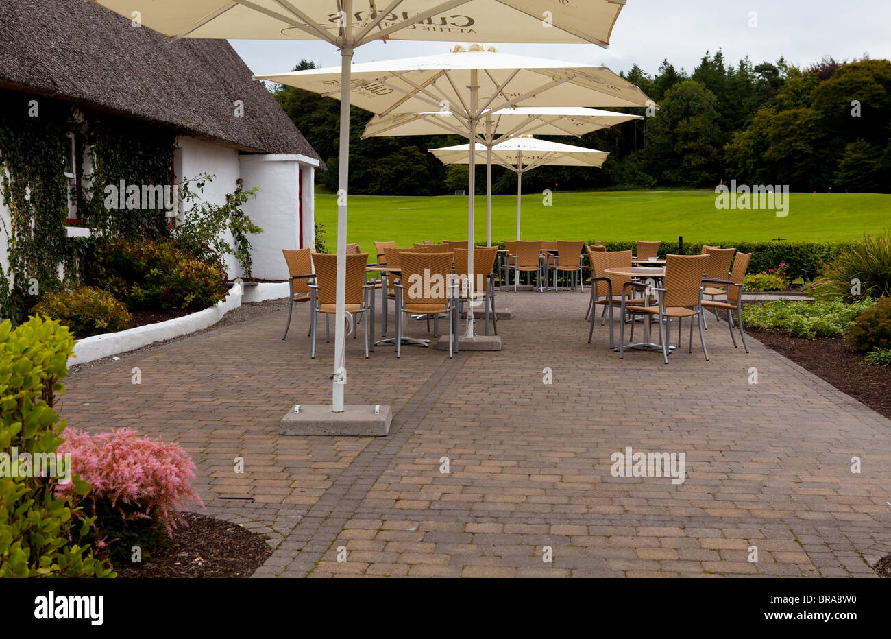 Outdoor Restaurant with Golf Course in the Background Stock Photo - Alamy