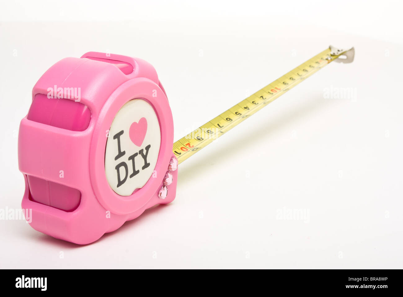 Shocking Pink Girly tape measure isolated on white Stock Photo - Alamy