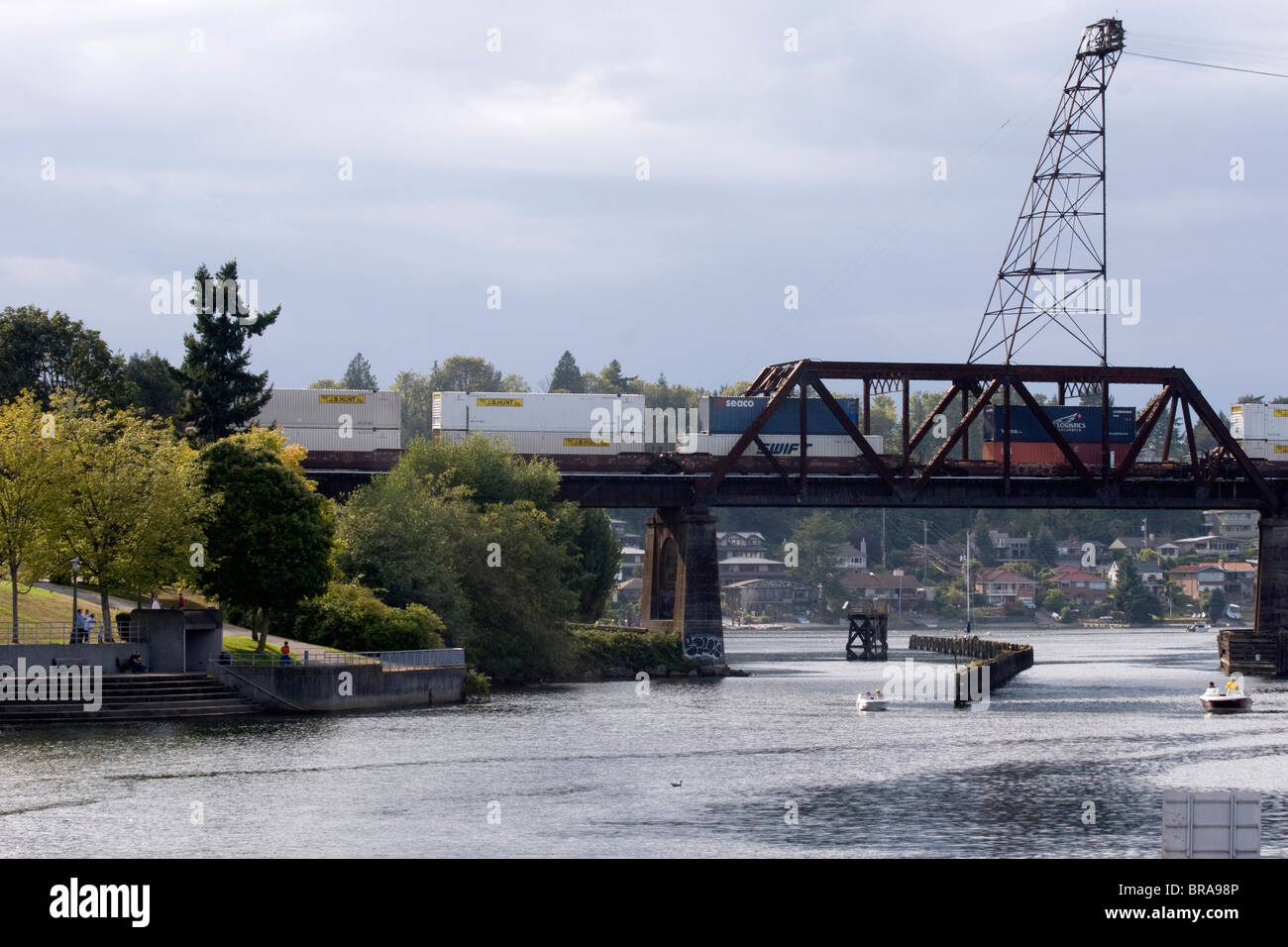 Burlington Northern Santa Fe intermodal freight train crosses lifting ...