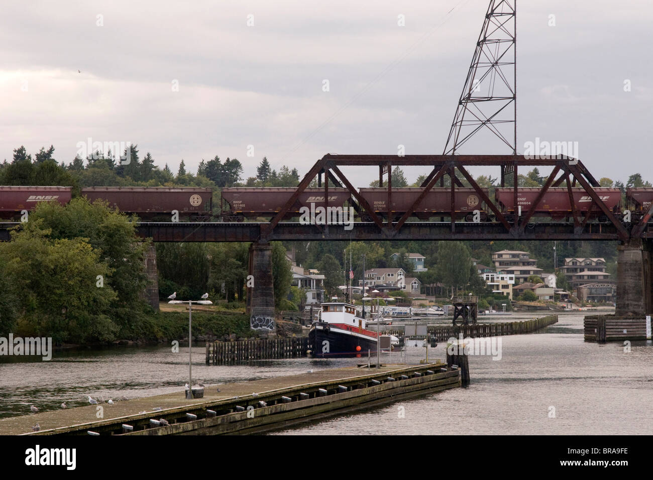 Burlington Northern Santa Fe freight train crosses lifting bridge at ...