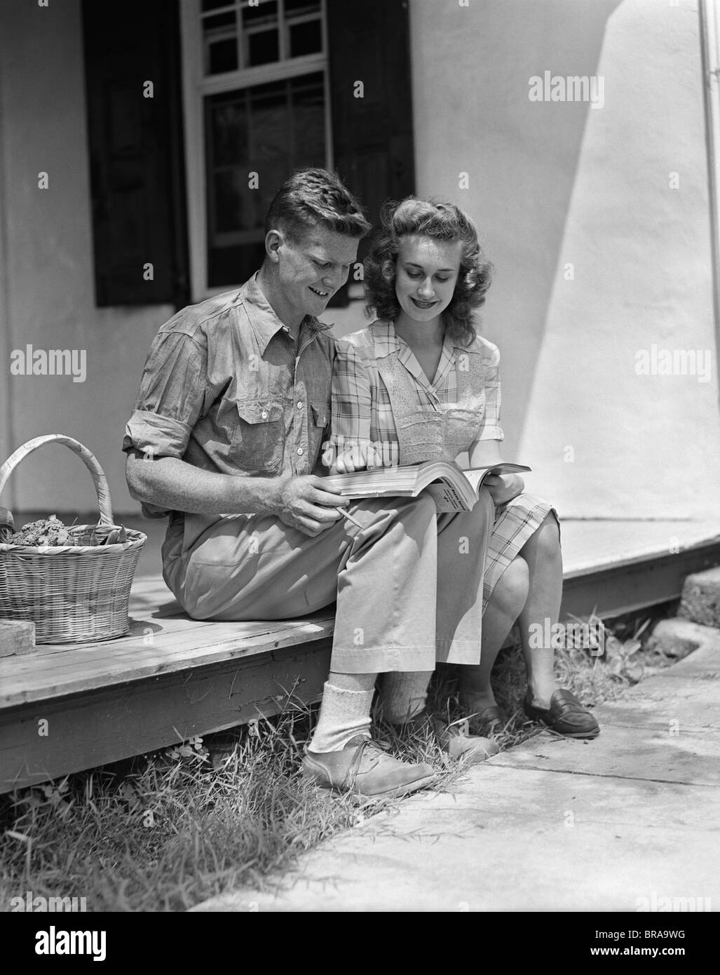 Young woman sitting on porch Black and White Stock Photos & Images - Alamy