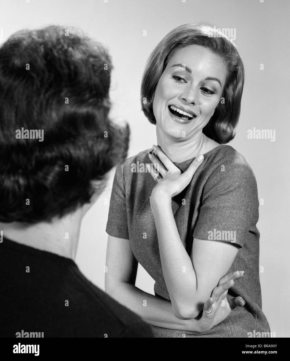Two people talking gesture Black and White Stock Photos & Images - Alamy