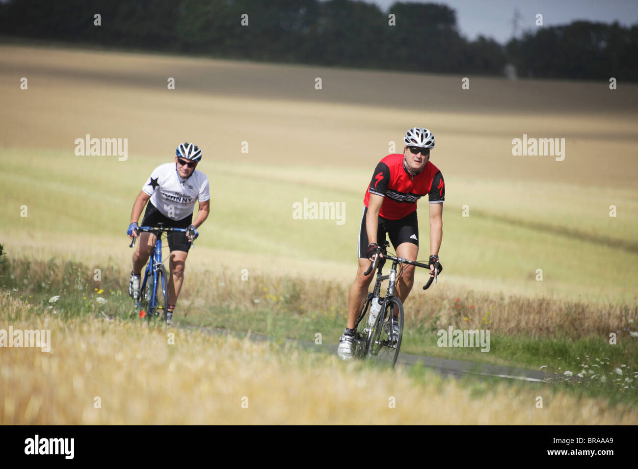 Cycling across a road hi-res stock photography and images - Alamy
