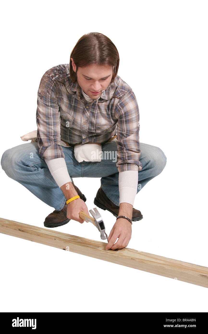 one young twenties construction worker man over white Stock Photo - Alamy