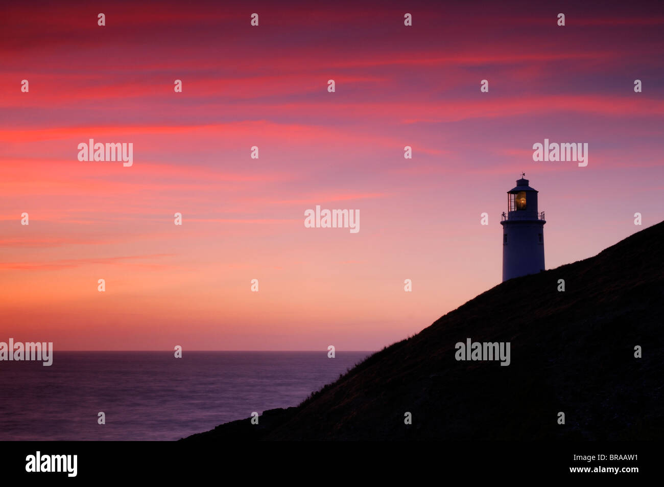 Trevose lighthouse at sunset, near Padstow, Cornwall, UK. July 2008 ...