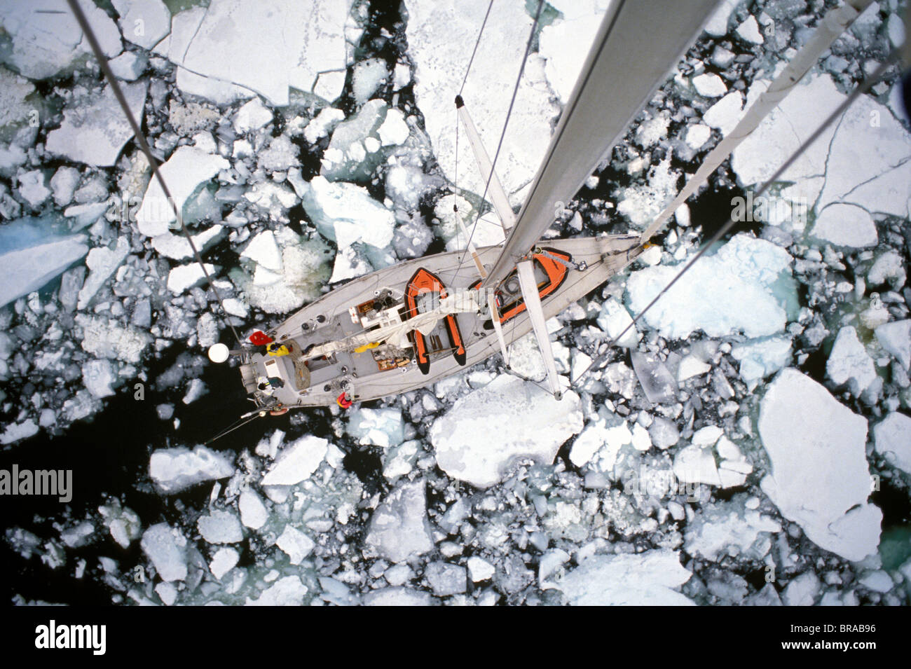 Steel yacht "Pelagic" motors carefully through ice on the Antarctic ...